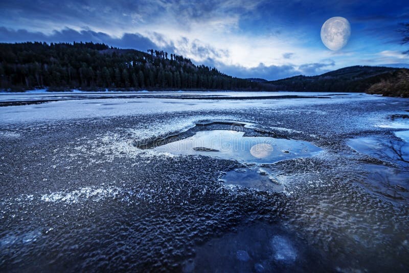 Frozen lake and moon stock photo. Image of spruce, coldness - 36475028