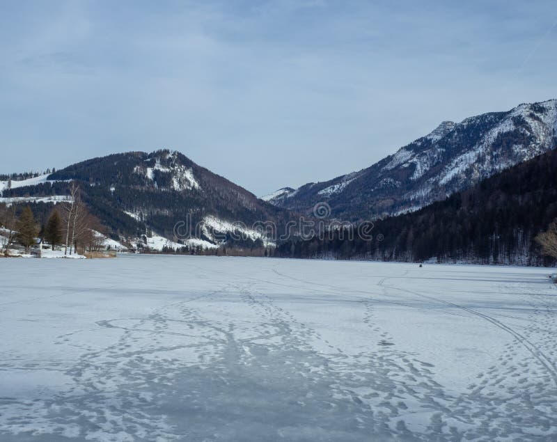 Frozen Lake with Mountains in the Background Stock Photo - Image of ...