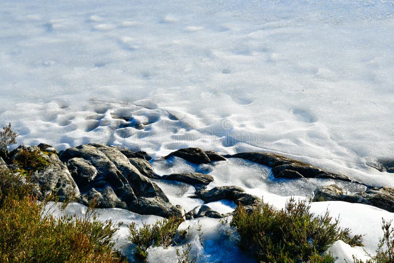 Frozen Lake and Rocky Lakefront Stock Image - Image of rock, february ...