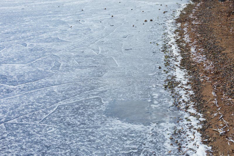 Frozen lake shore and snow stock photo. Image of land - 208393396