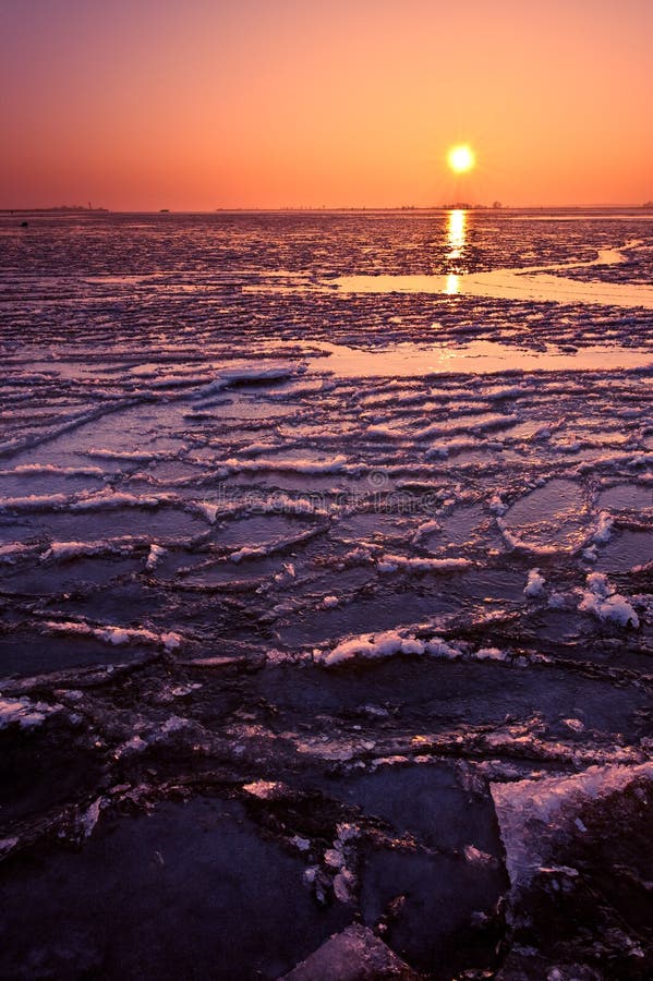 Frozen lake and sunset stock photo. Image of scenery - 10870304