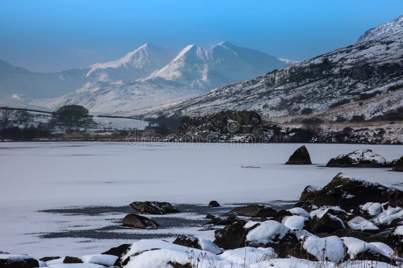 Frozen Lake - and View To Snowdon Stock Photo - Image of lake, range ...