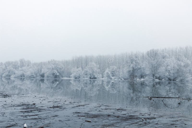 Frozen Lake in Winter, Winter Lake Scene Reflecting in the Water Stock ...