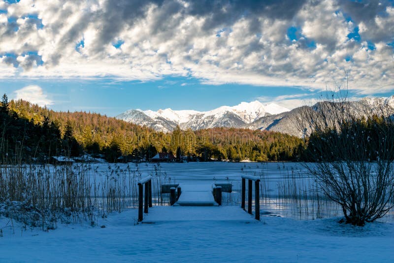 View of the Frozen Lautersee and the Snowy Alps in Mittenwald Stock ...