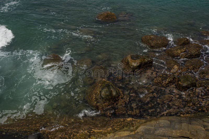 Frozen Lava Stones on the Ocean Stock Photo - Image of background ...