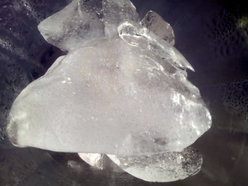 Frozen Lump of Water in a Glass Stock Image - Image of water, glass ...