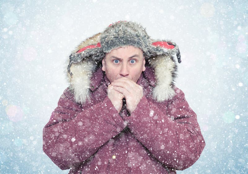 Frozen Man in Winter Clothes Warming Hands, Cold, Snow, Blizzard Stock ...