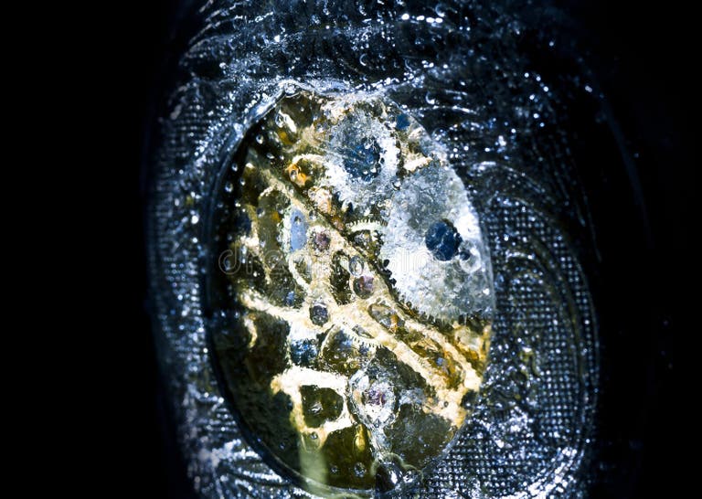 Frozen Mechanical Watch in Ice Stock Photo - Image of clear, frosted ...