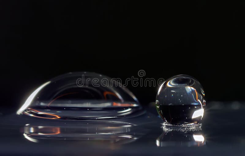 Frozen Moment in Which a Drop Falls on a Liquid Surface, Half a Sphere ...