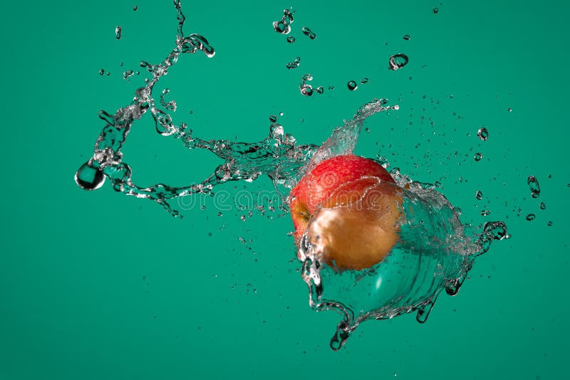 Frozen Motion of Water Splashes and Red Apple Stock Image - Image of ...