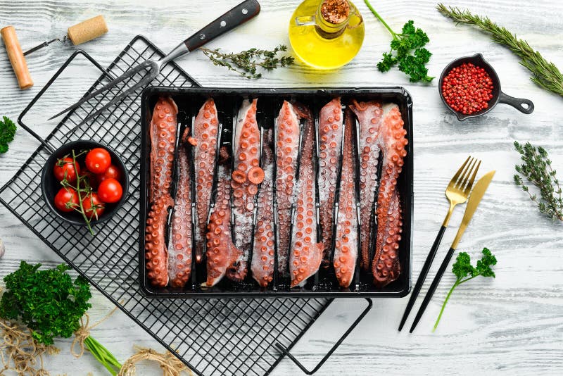 Frozen Octopus Tentacles in a Plastic Box. Stock Photo - Image of ...