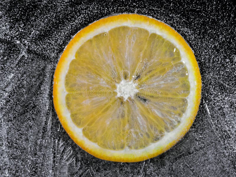 Frozen orange stock image. Image of fruit, orange, slice - 68566975