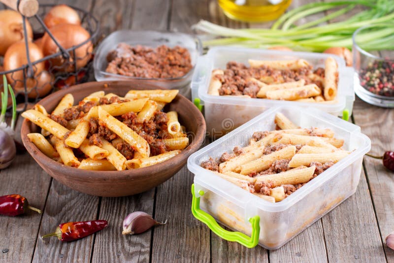 Frozen Pasta, Ready Meal. Frozen Pasta with Minced Meat on a Wooden ...