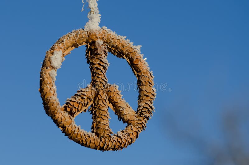 Frozen Peace Sign Hanging Against a Blue Sky Stock Image - Image of ...