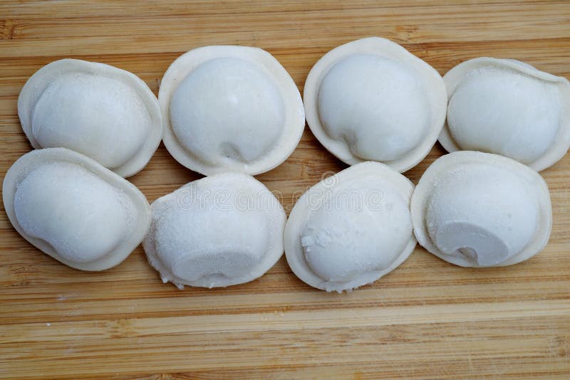 Frozen Pelmeni on a Wooden Desl Stock Photo - Image of culture, food ...