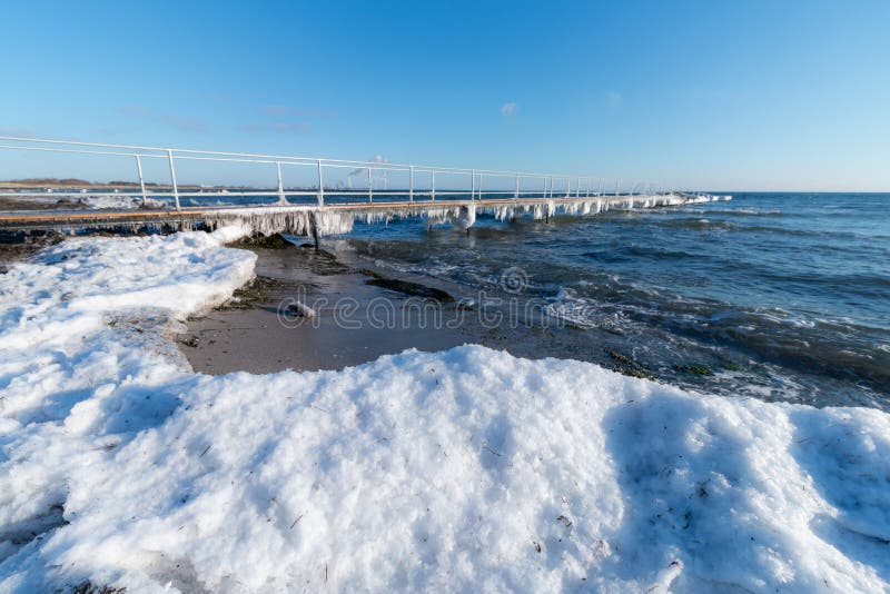 Frozen Pier and Snow in Beach Day Time at Denmark Stock Photo - Image ...
