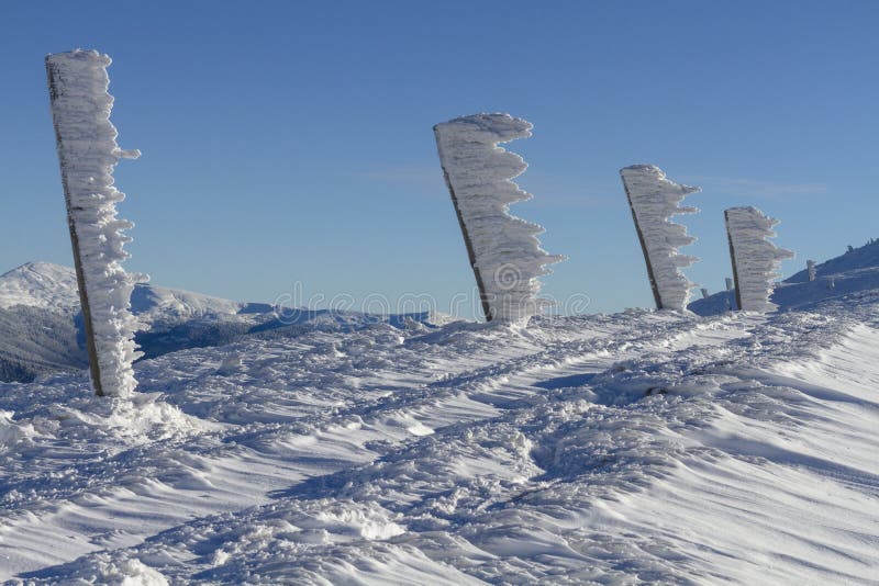 Frozen Pillars with Blown Snow and Icicles, Snow Flags in the Mountains ...
