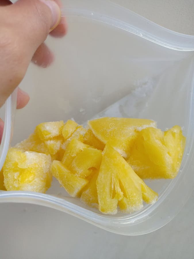 Frozen pineapple pieces stock photo. Image of baking - 311613662
