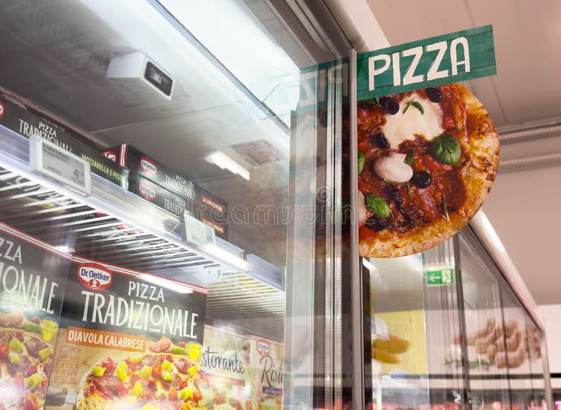 Frozen Pizza Display in Supermarket Aisle with Various Packaging ...