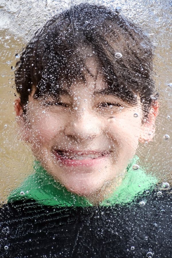 Young Boy Changing Tire stock image. Image of helping - 60161393