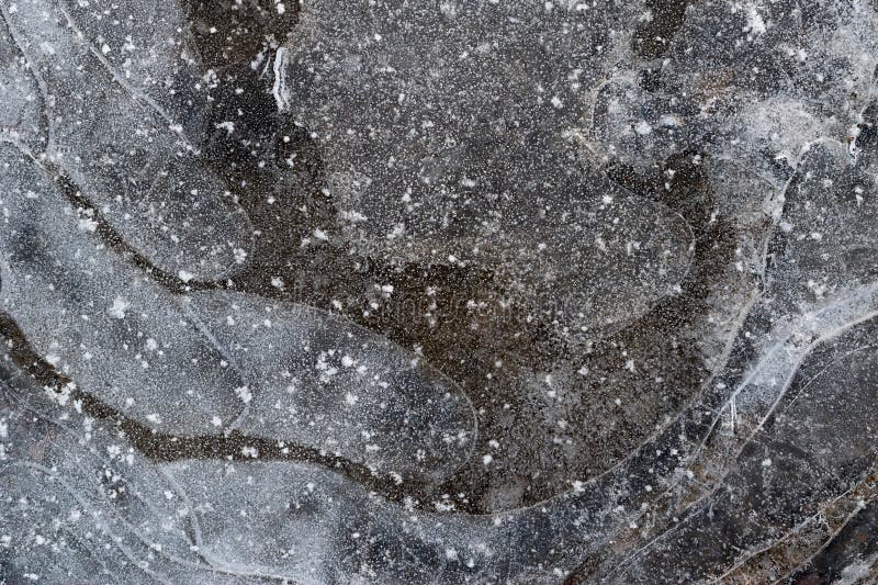 Frozen puddle close up stock photo. Image of frozen - 321341748