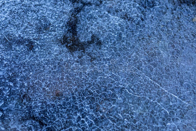 A Frozen Puddle. Nature Background. Stock Photo - Image of blue, snow ...