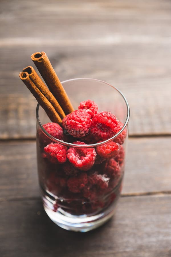 Frozen Raspberry with Cinnamon in Glass. Stock Photo - Image of field ...