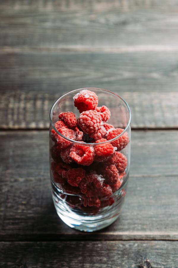 Frozen Raspberry with Cinnamon in Glass. Stock Image - Image of dark ...