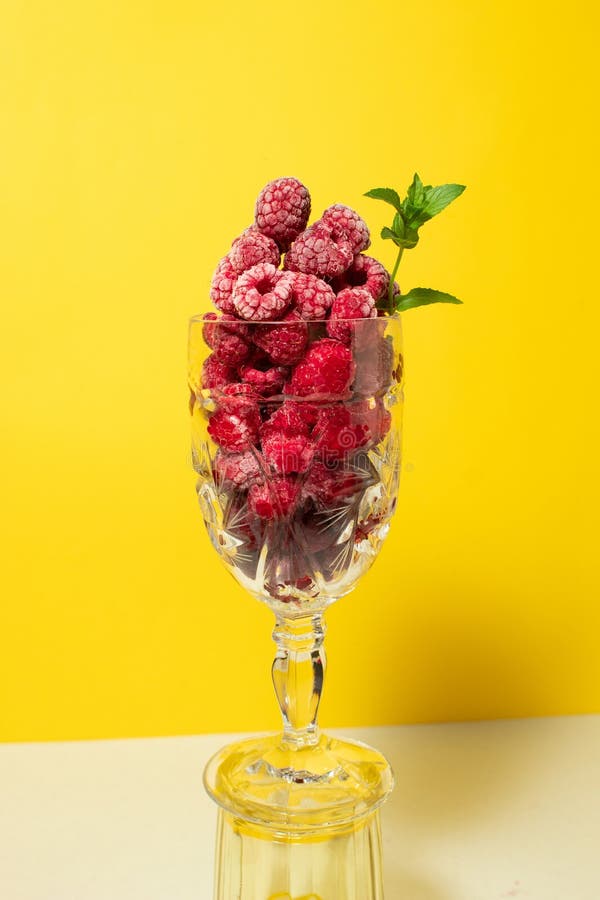 Frozen Raspberry Fruit with Mint in a Glass. Still Life Stock Photo ...
