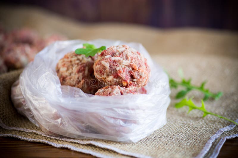 Frozen Raw Meatballs From Beef And Pork With Carrots And Rice Stock