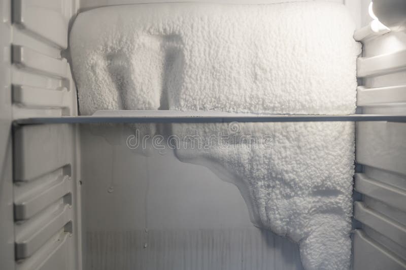 Frozen Refrigerator that Needs To Be Defrosted. Stock Image - Image of ...
