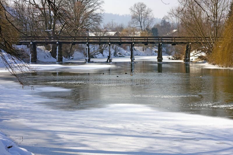 Frozen river with bridge stock photo. Image of cold, landscape - 23701888