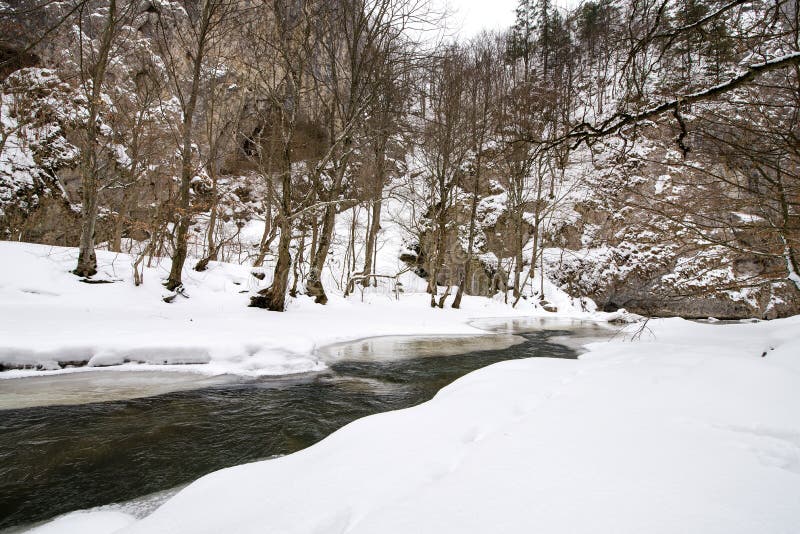Half Frozen River with Waterfall Covered with Snow and Ice Stock Image ...