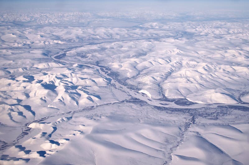 A Frozen River Running through Ice and Snow in Alaska Stock Image ...