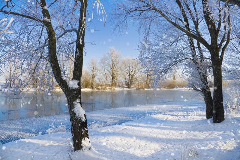 Frozen River at Snowfall. Winter Landscape. Stock Image - Image of ...