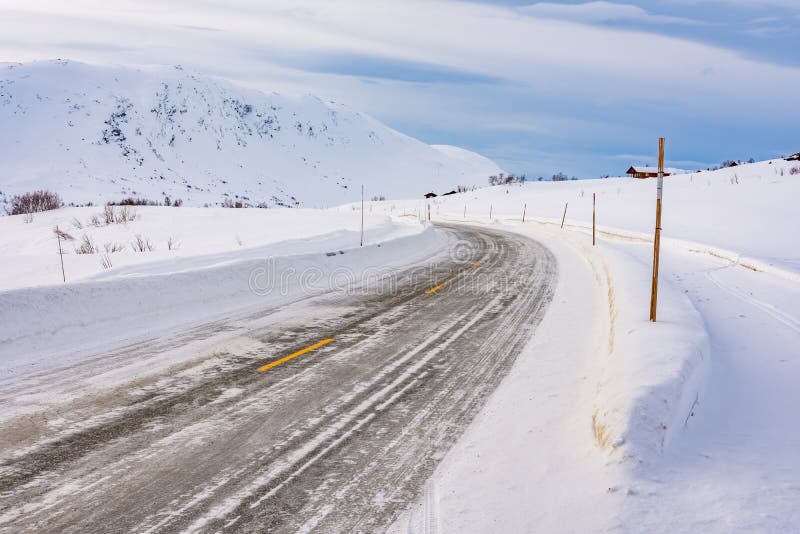 Frozen Road with Snow-capped Mountains in Norway Stock Photo - Image of ...