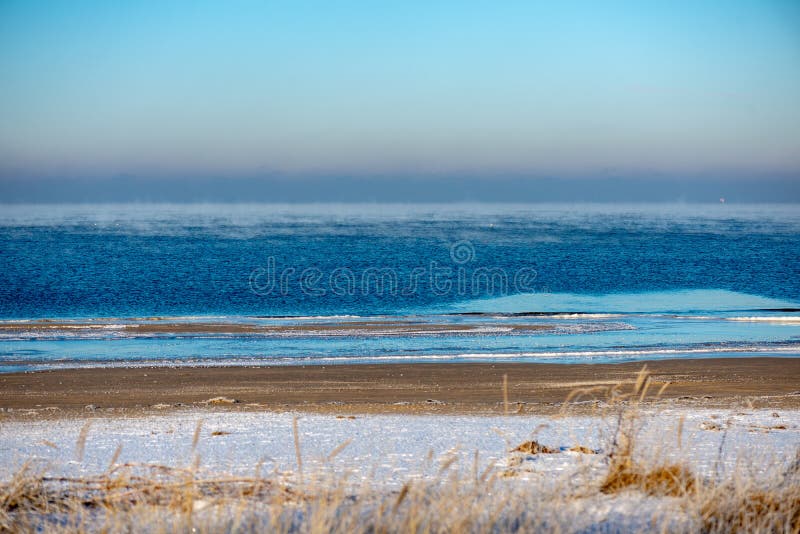 Frozen Sea Beach in Winter with Low Snow Coverage Stock Image - Image ...