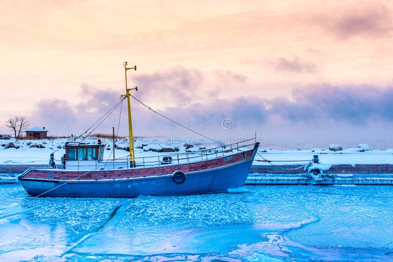 Frozen Sea and Fishing Boat Stock Photo - Image of quiet, cold: 67980184