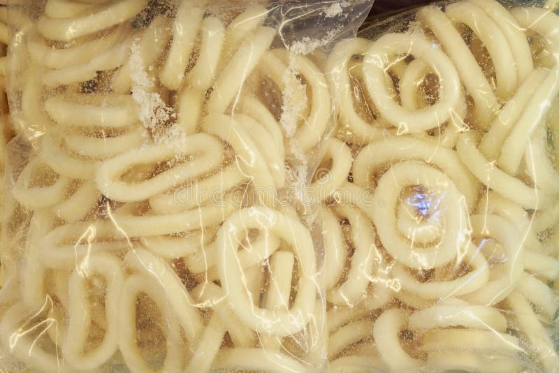 Frozen Squid Rings. Freezer with Seafood in the Fish Market Stock Photo ...
