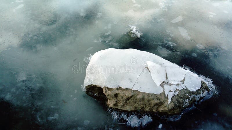 Frozen stone stock photo. Image of frozen, snow, winter - 85838068