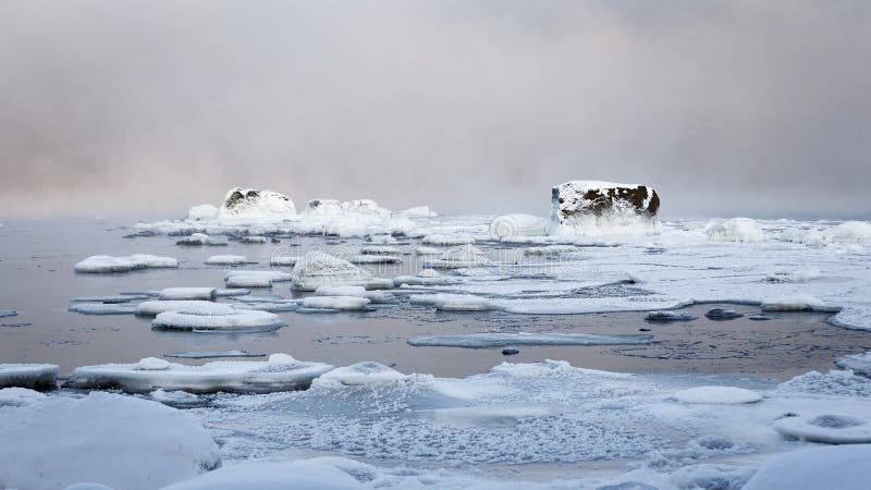 Frozen stones stock photo. Image of mist, stones, sunset - 65236860