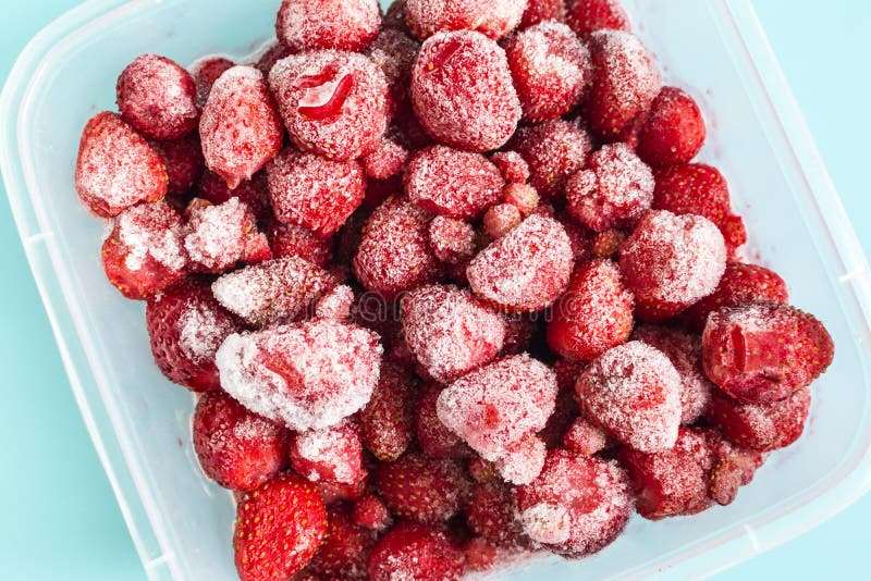 Frozen Strawberries with Ice Crystals in a Light Dish Stock Photo ...