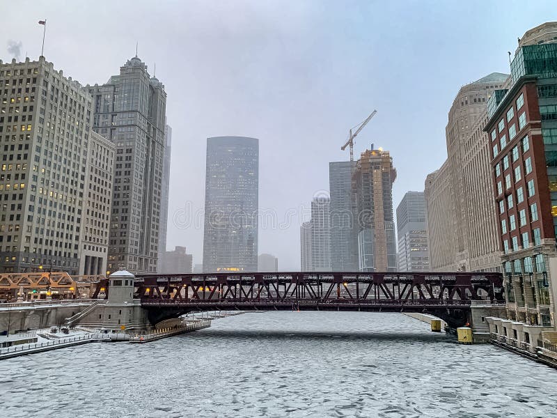 Frozen Surface of Chicago River during Evening Snowfall Stock Image ...