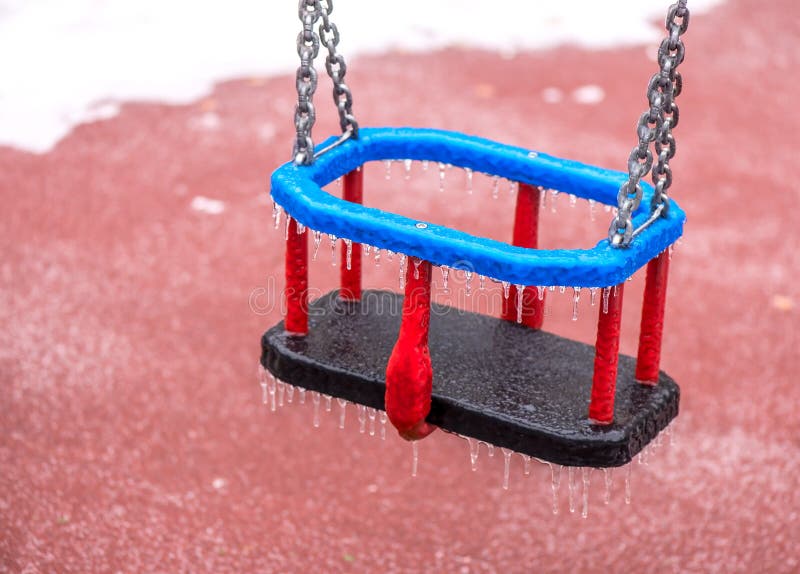 Frozen swing with icicles stock image. Image of crystal - 140616235