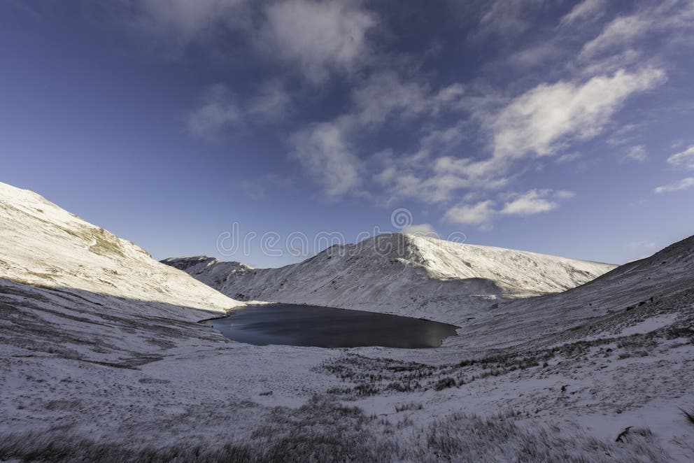A Frozen Tarn in Winter in the Lake District Stock Image - Image of ...