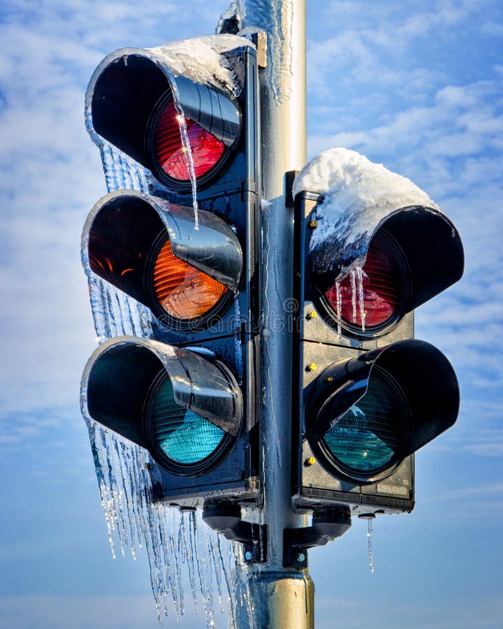 Traffic Lights Hanging Above Street Stock Photo - Image of metal, light ...