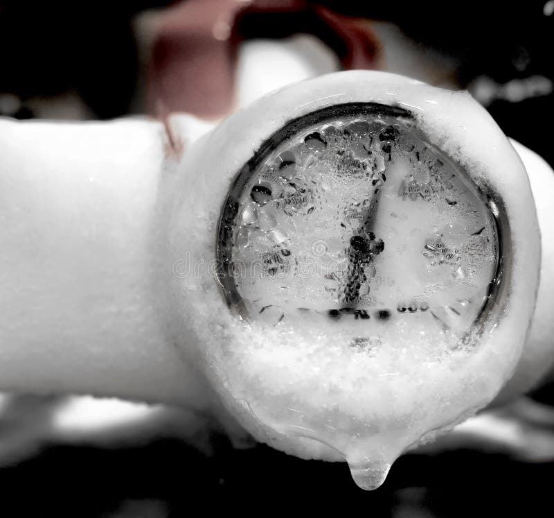 Frozen Liquid Nitrogen Carrying Pipes with a Valve and Black Plastic ...