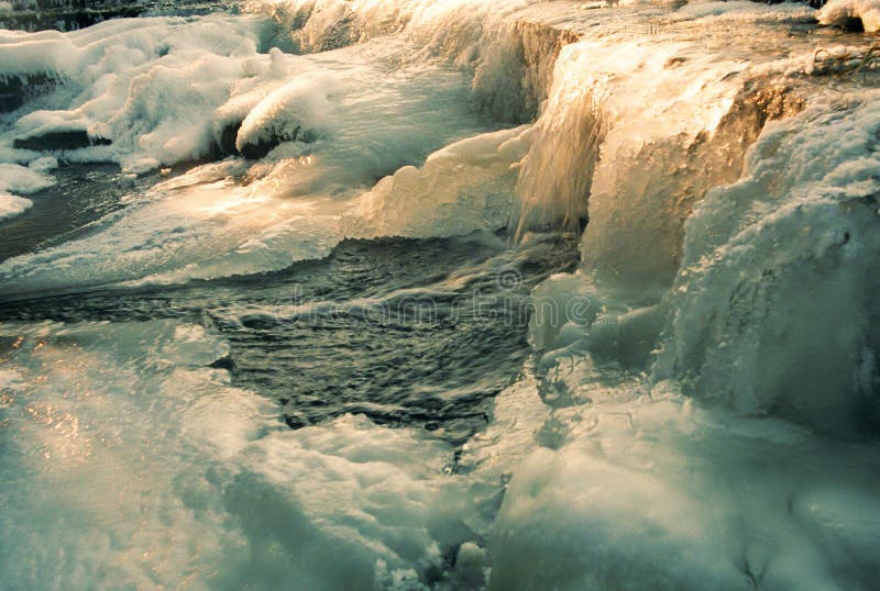 Frozen water at dam stock image. Image of frigid, creek - 3339555