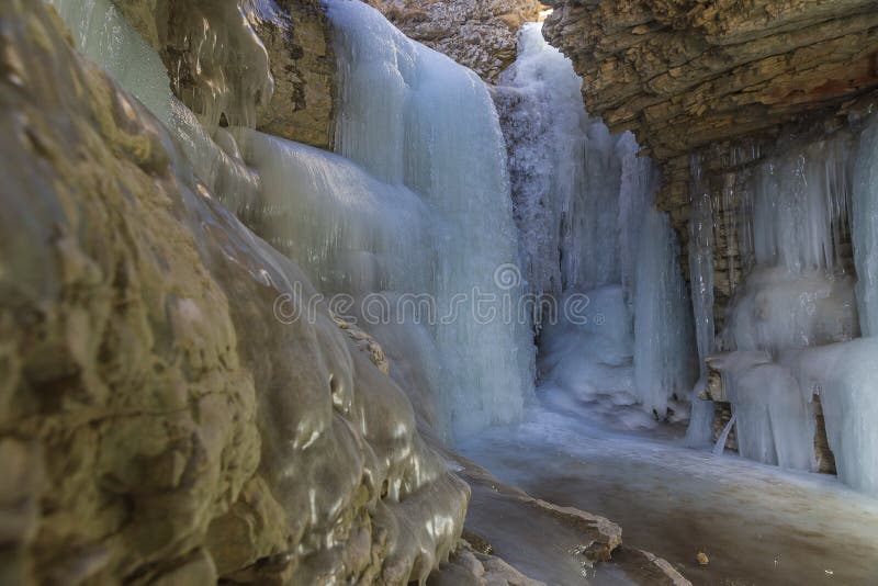 Frozen Waterfall in a Gorge High in the Mountains Stock Photo - Image ...