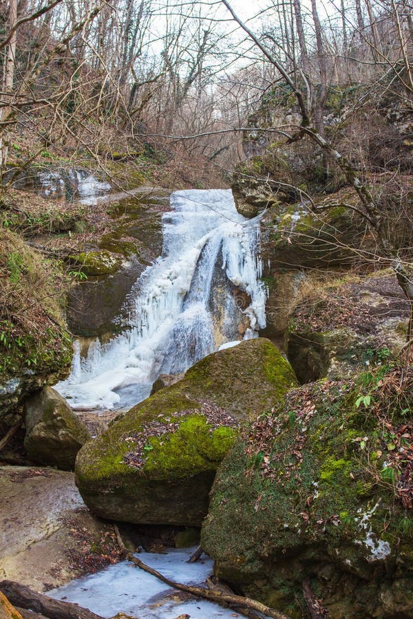 Frozen Waterfall in an Ice Shell in the Riverbed, Winter Time Stock ...